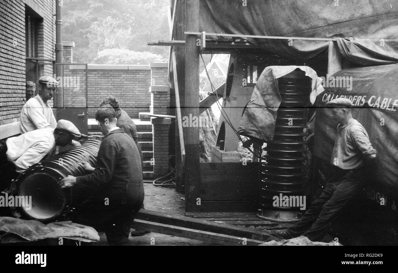 1937 Callender Cables laying High Voltage test cable at KEMA test ...