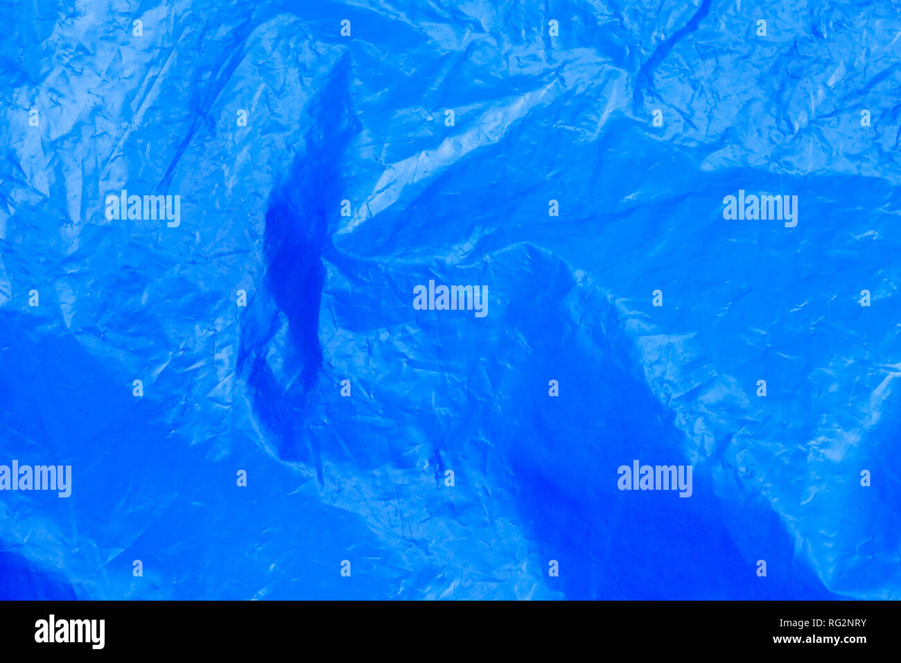 Abstract background crumpled plastic film texture blue garbage bag ...