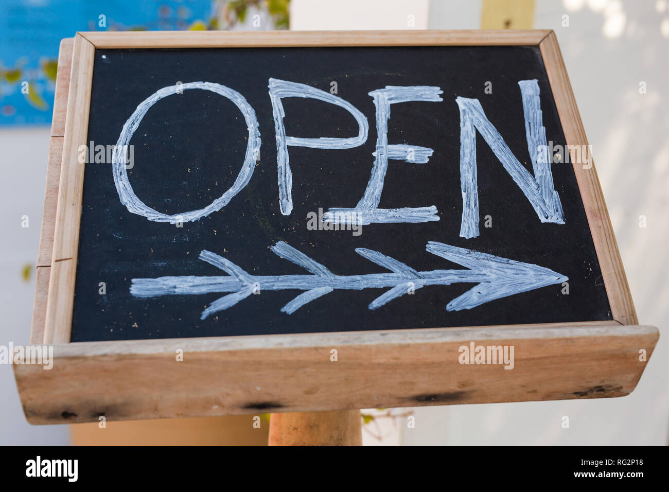 Wooden sign board showing the direction to cafe or market Stock Photo ...