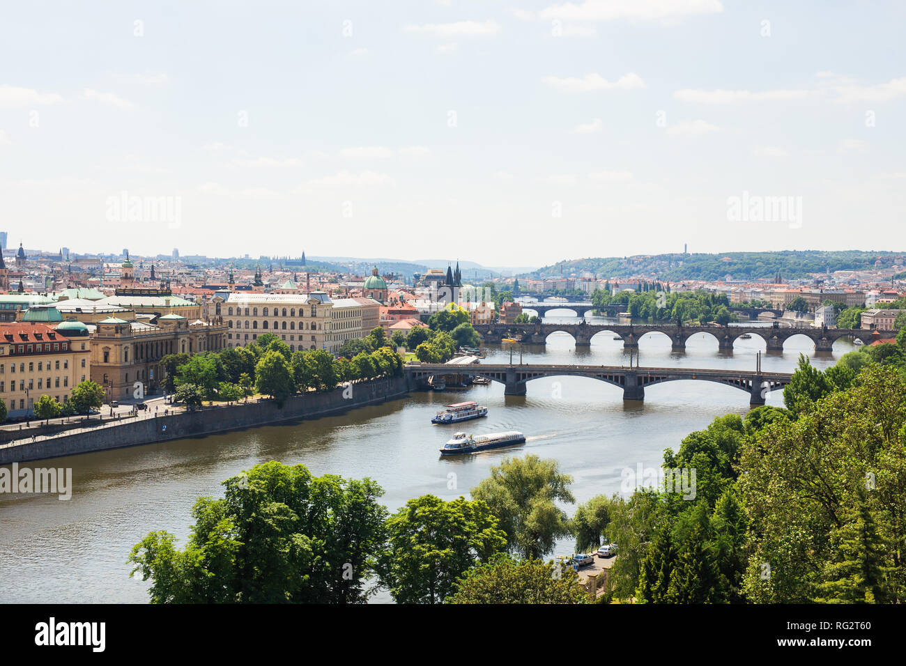 Scenic view of bridges on the Vltava river and of the historical center ...
