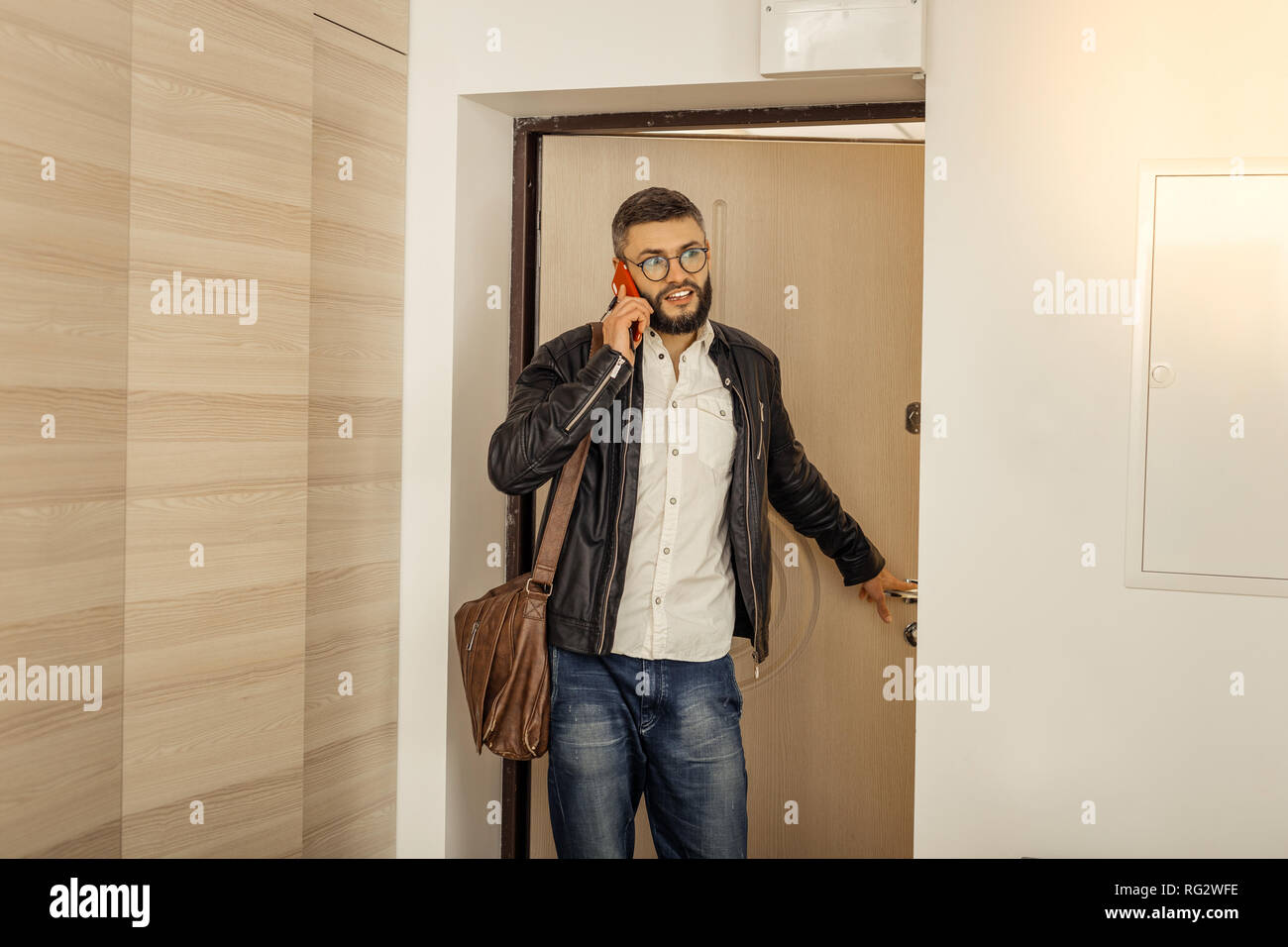 Handsome Tall Short Haired Bearded Man With A Bag Looking Surprised