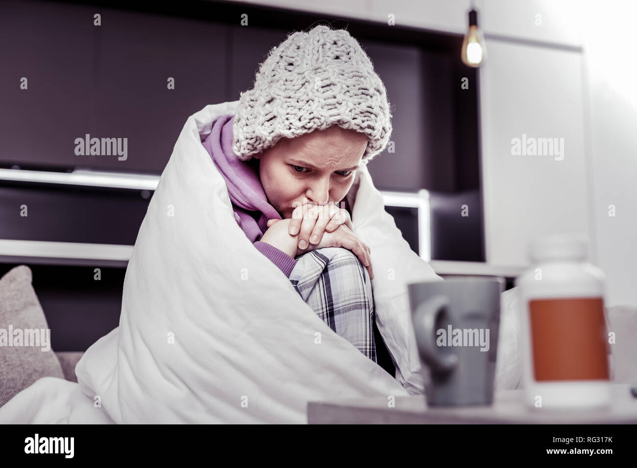 Depressed female person being deep in her thoughts Stock Photo - Alamy