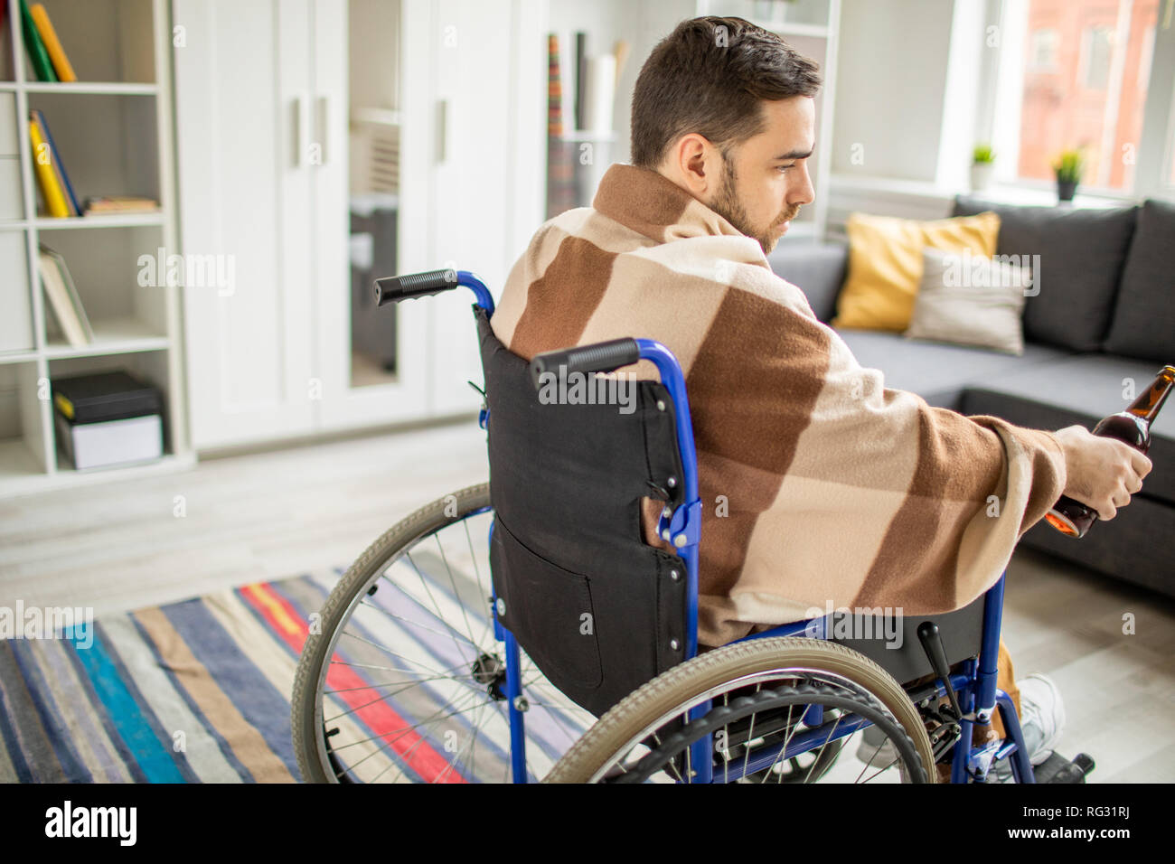 Disable man at home Stock Photo - Alamy
