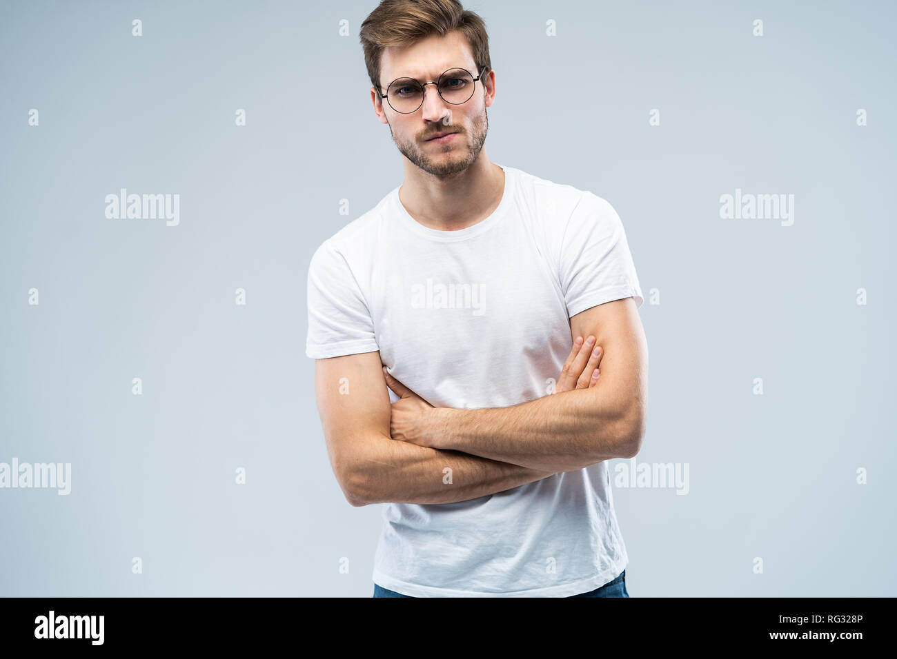Serious thoughtful clever scientific worker wears spectacles. Pensive ...