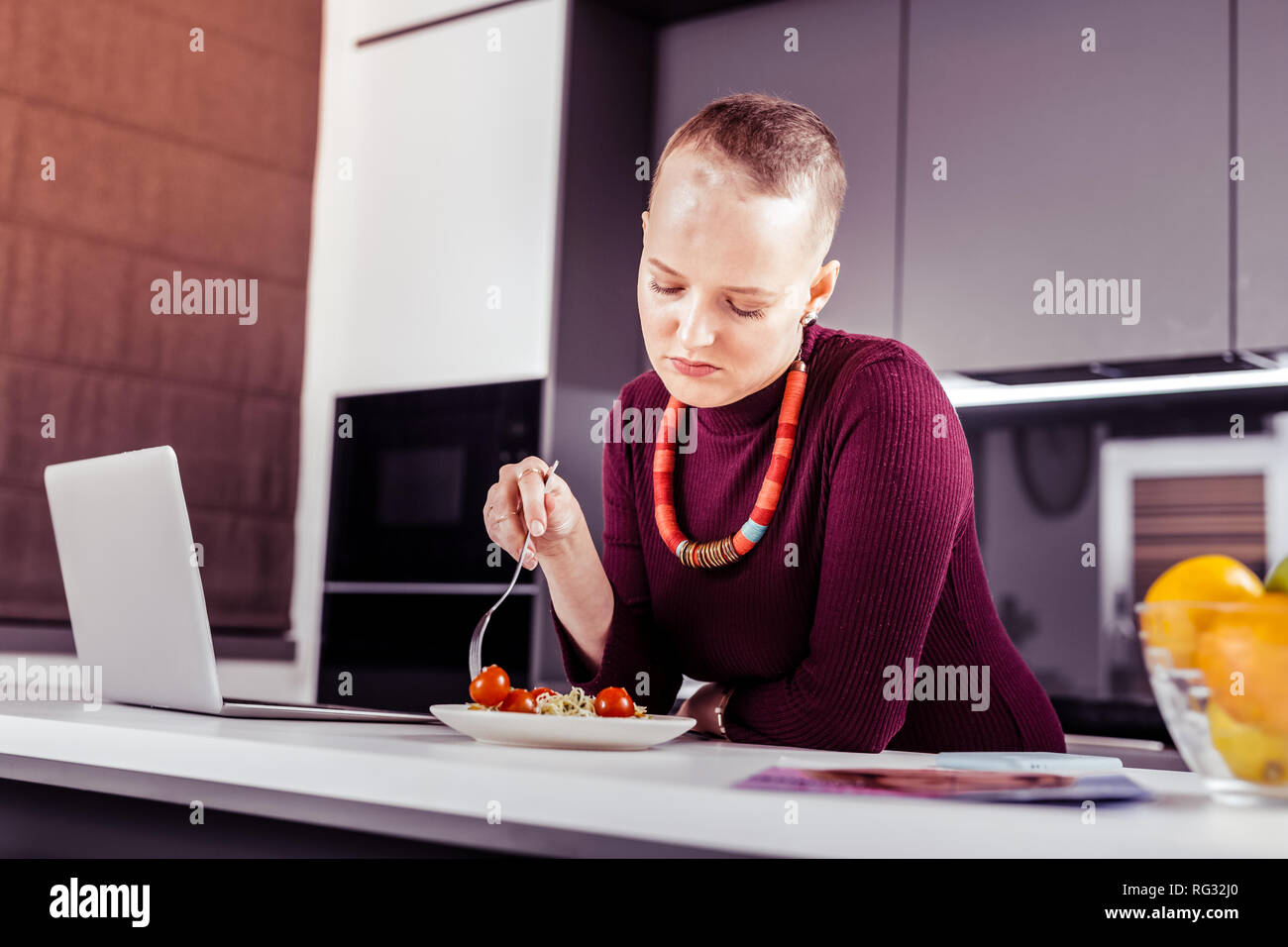 Young woman being deep in her thoughts Stock Photo - Alamy