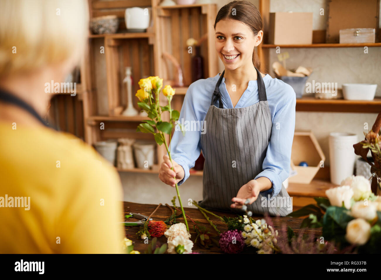 Shopkeeper selling customer hi-res stock photography and images - Alamy