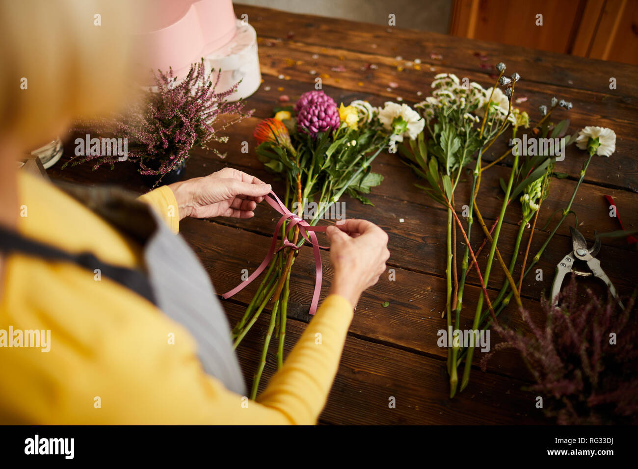 Florist Making Bouquet Close up Stock Photo - Alamy