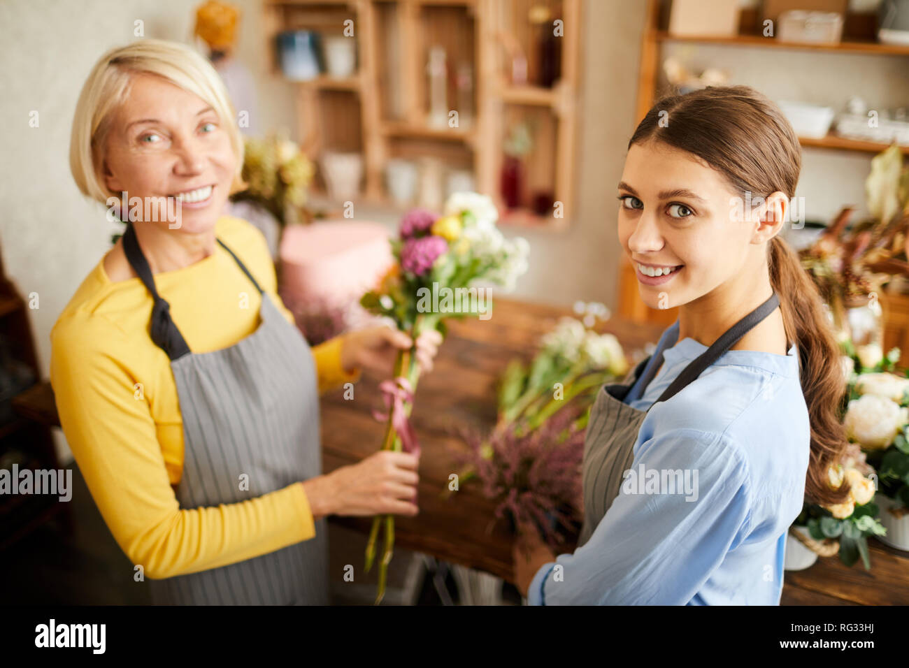 Florists Posing in Flower Shop Stock Photo - Alamy