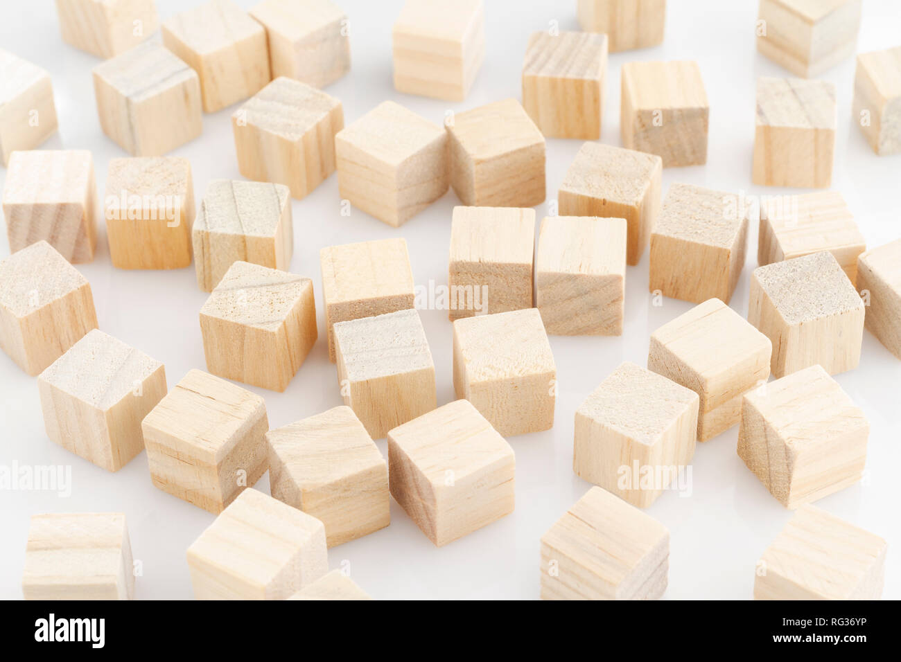 wooden blocks arranged randomly on white background Stock Photo - Alamy