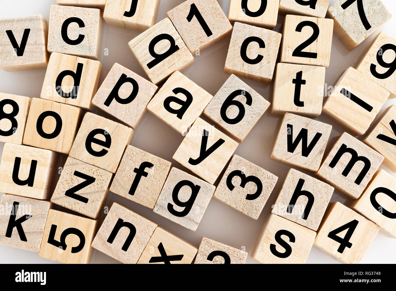wooden blocks with numbers and letters on white background Stock Photo ...