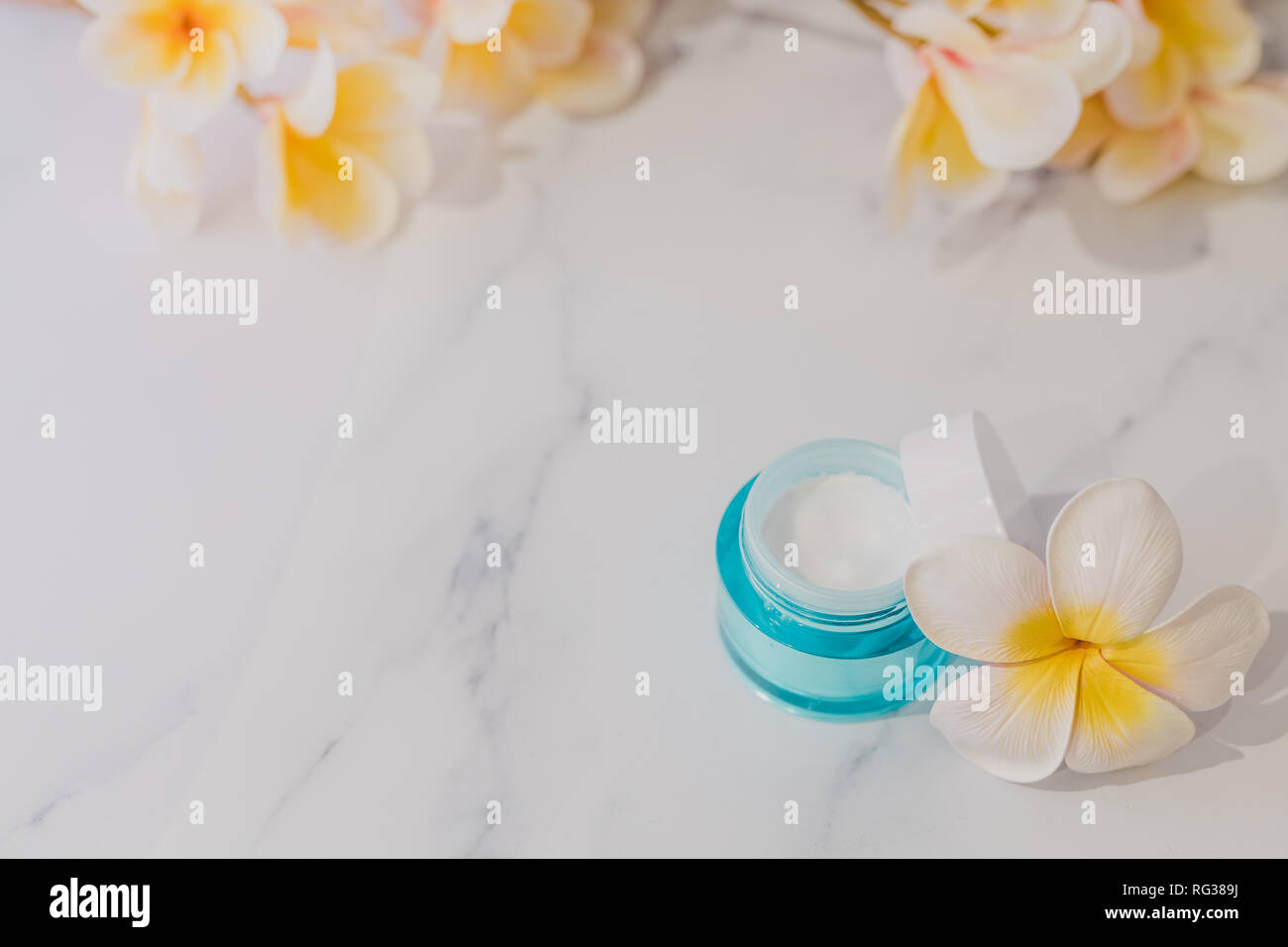 spa and skincare treatments concept, moisturiser pot on marble table ...