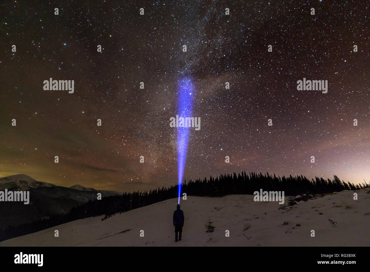 Man standing under stars hi-res stock photography and images - Alamy