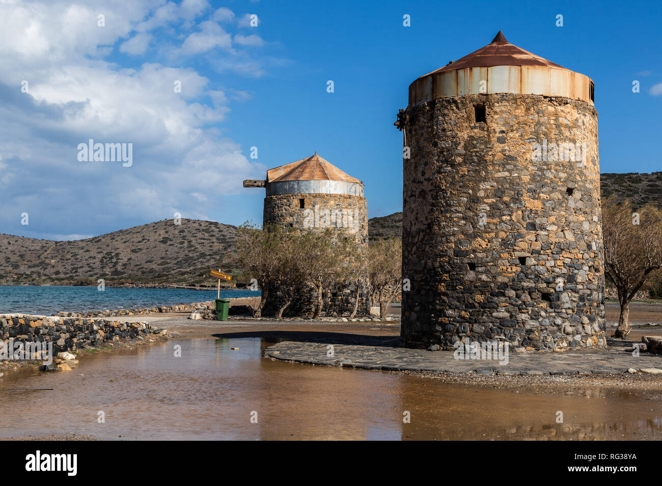 old wind mills near Elounda Village Crete Stock Photo - Alamy