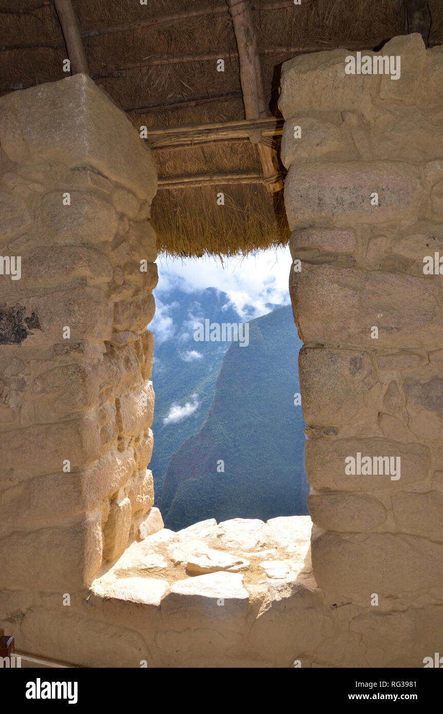 MACHU PICCHU / PERU, August 16, 2018: Window in Machu Picchu overlooks ...