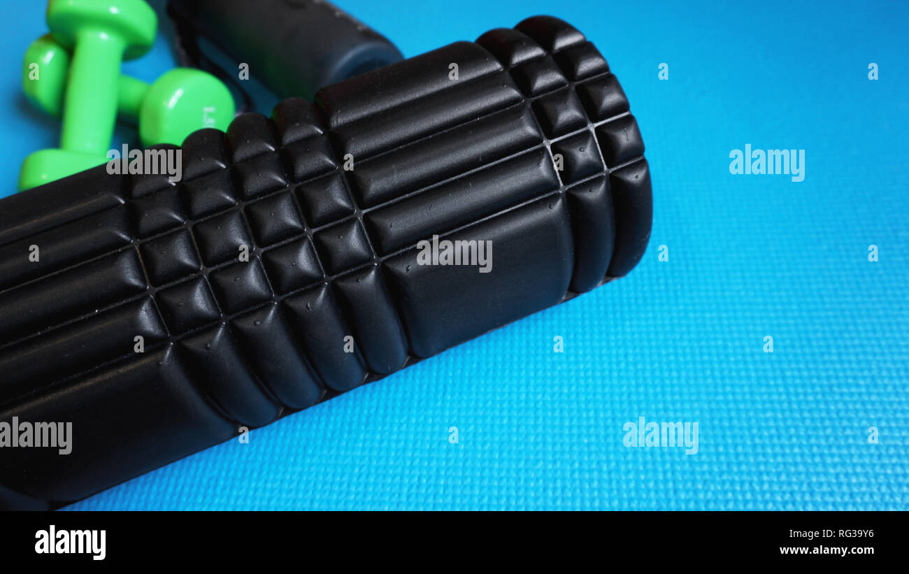 Foam Roller Gym Fitness Equipment Blue background self Myofascial ...