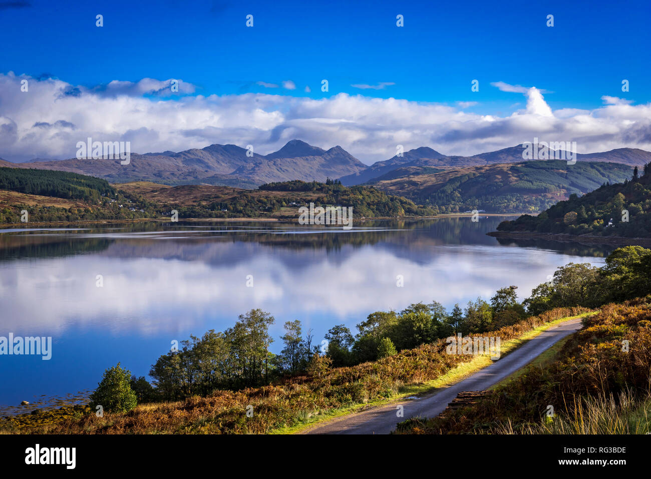 The view looking down to Strontian with Loch Sunart reflecting the ...