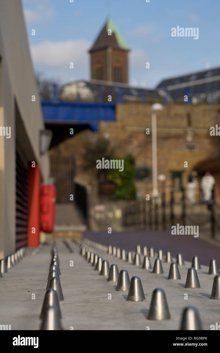 Anti-homeless spikes and rough surfaces installed in a luxury housing ...