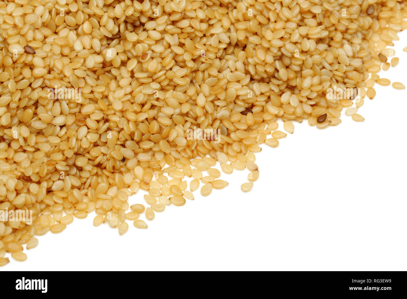 Sesame seeds isolated on white background Stock Photo - Alamy