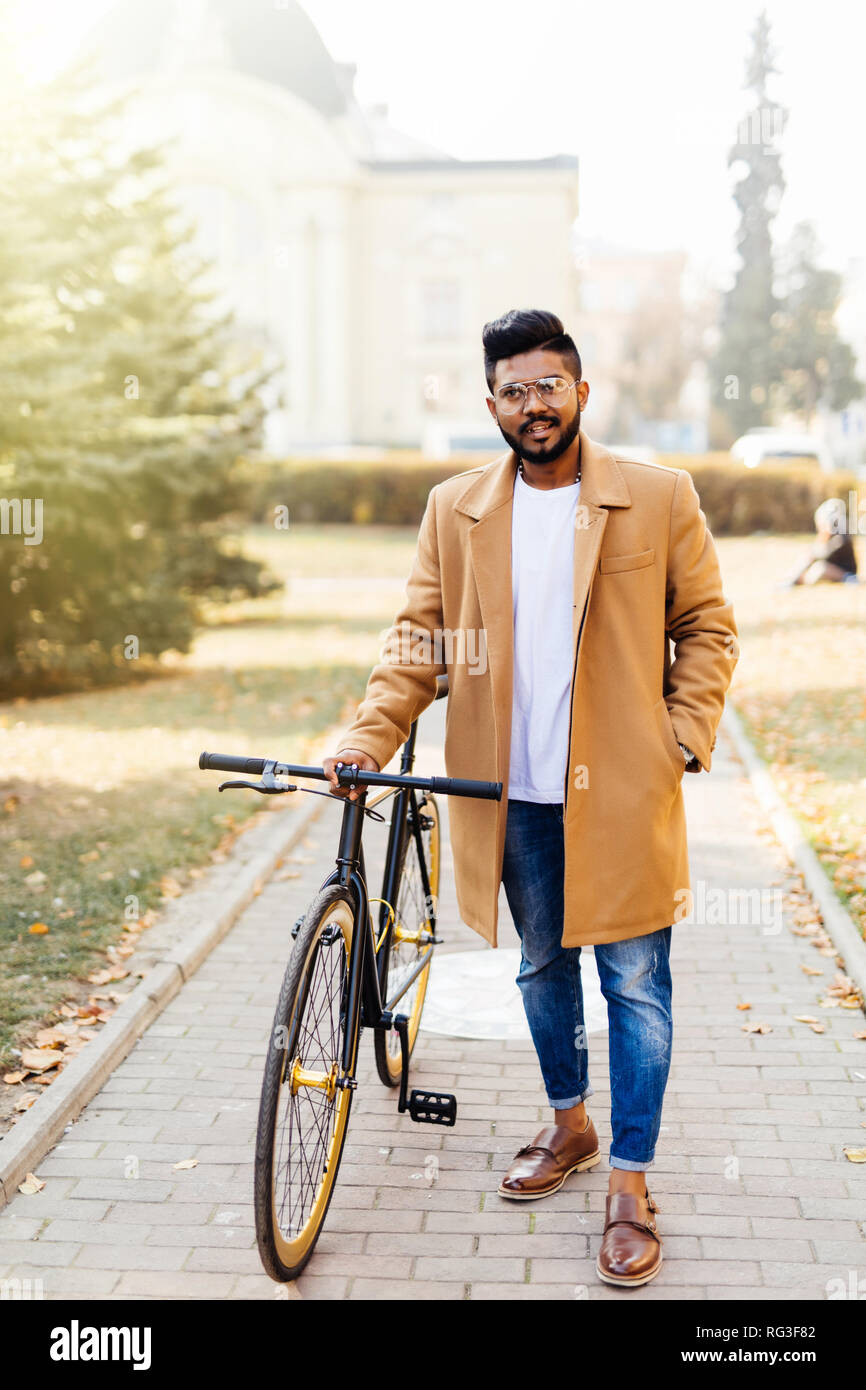 Indian man riding cycle in hi-res stock photography and images - Alamy