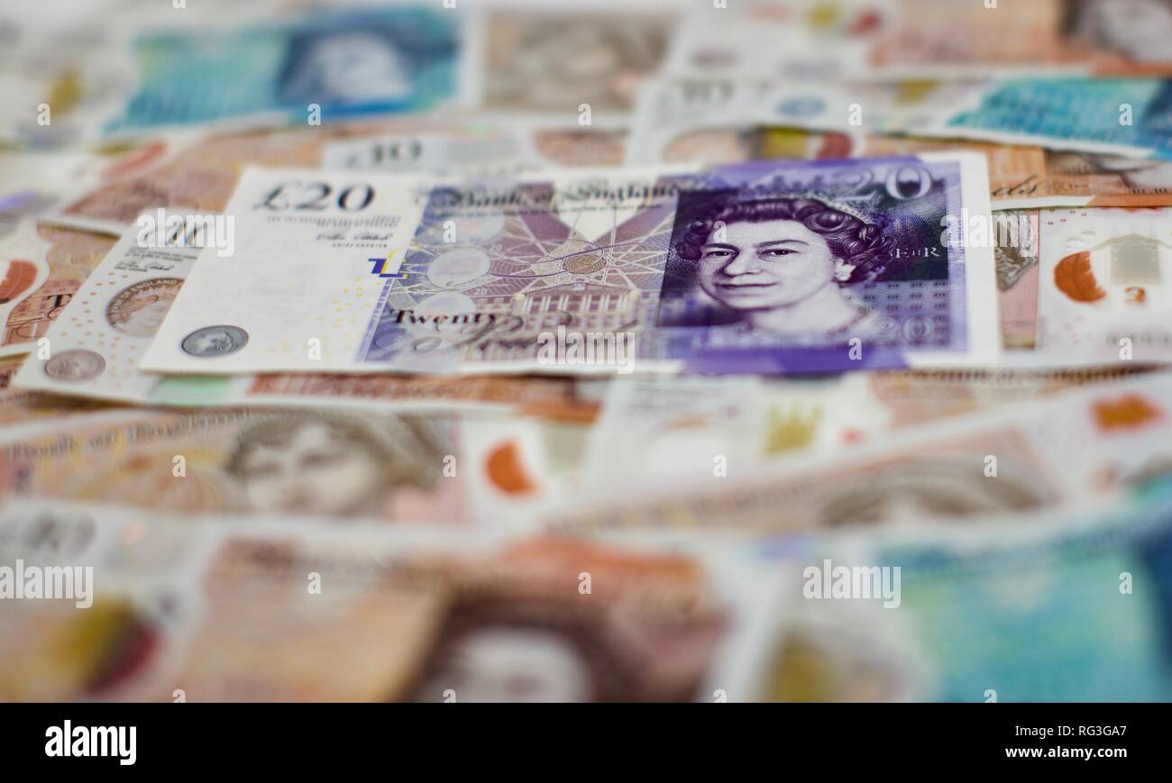 £20 pound note laying on top of the new polymer £5 & £10 Banknotes ...