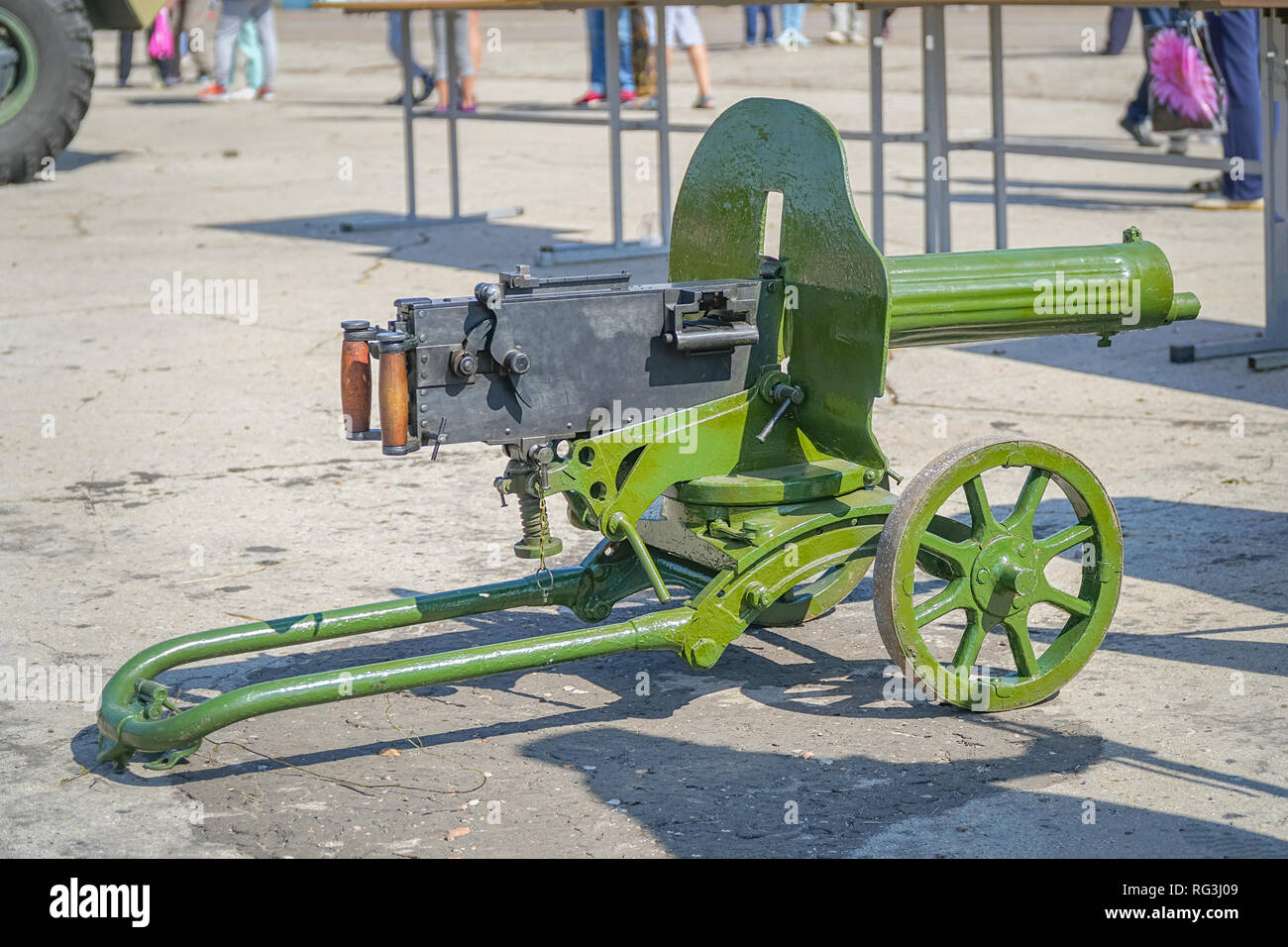 Old machine gun green on a natural background Stock Photo - Alamy