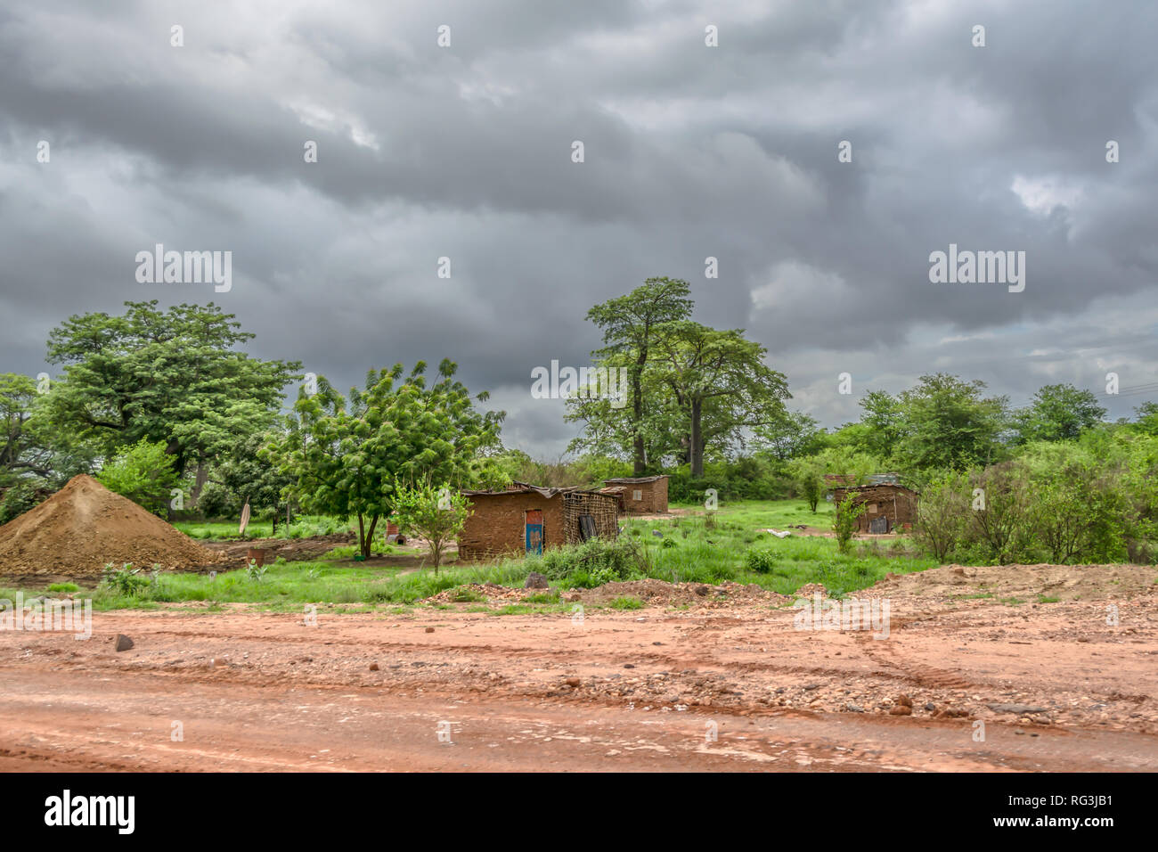 Typical village view, traditional terracotta houses with zinc plate ...