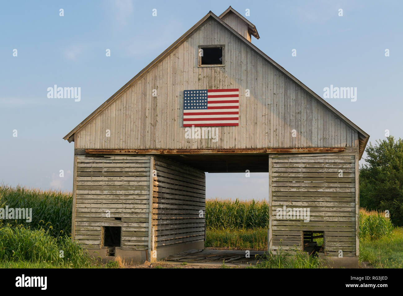 Old rustic barn in the Midwest with painted American flag. LaSalle ...