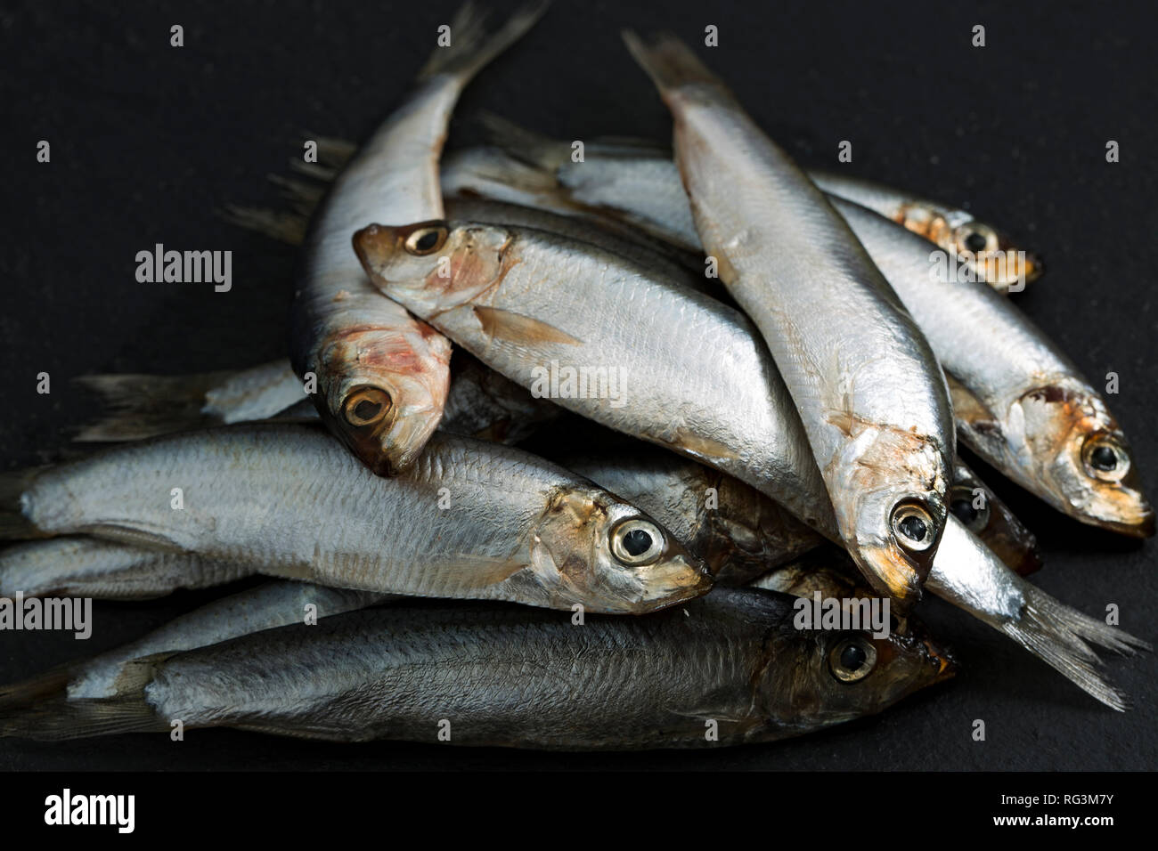 Sprats, Sprattus sprattus, bought from a supermarket in the UK. Sprats ...