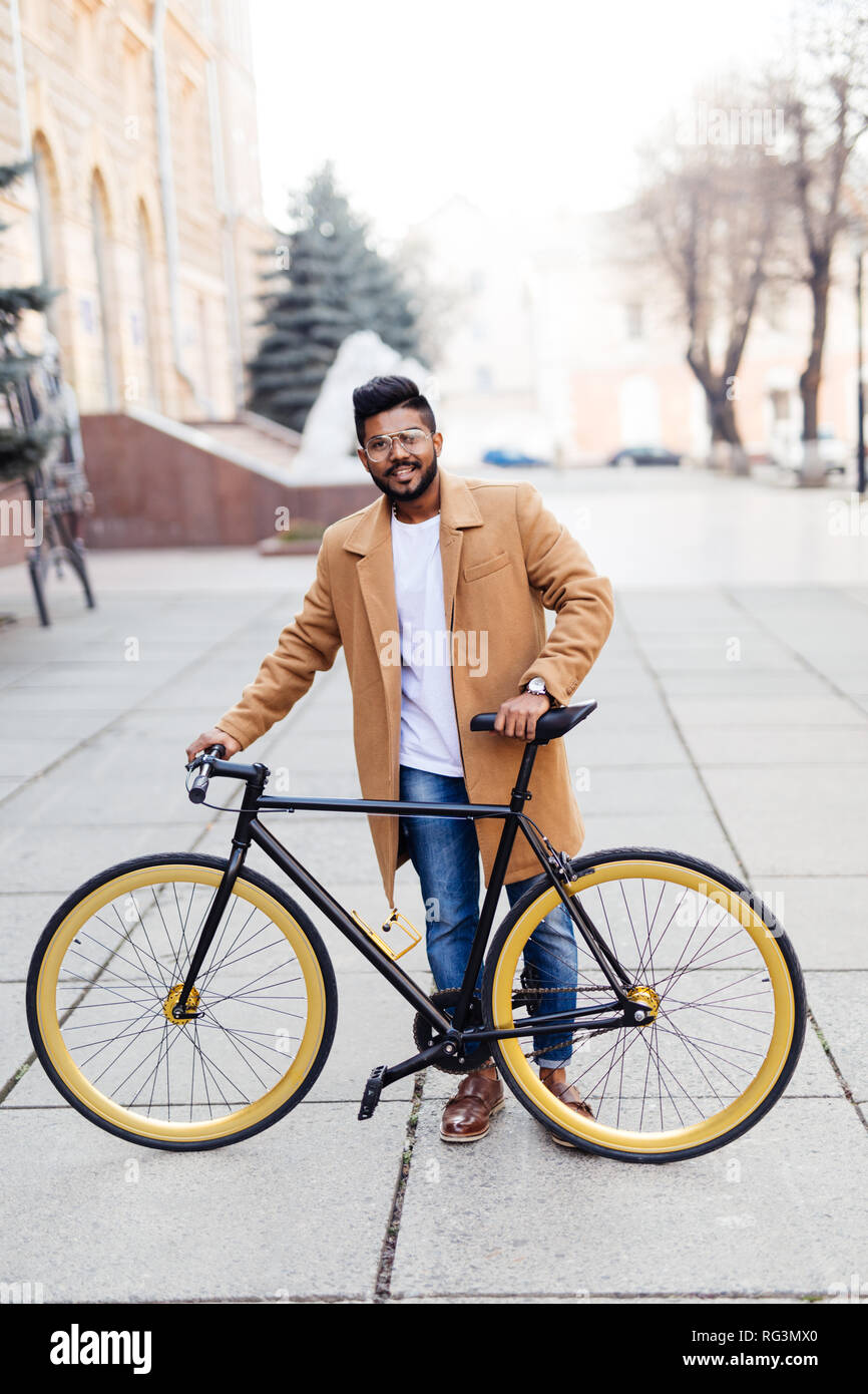Man posing next bike hi-res stock photography and images - Alamy
