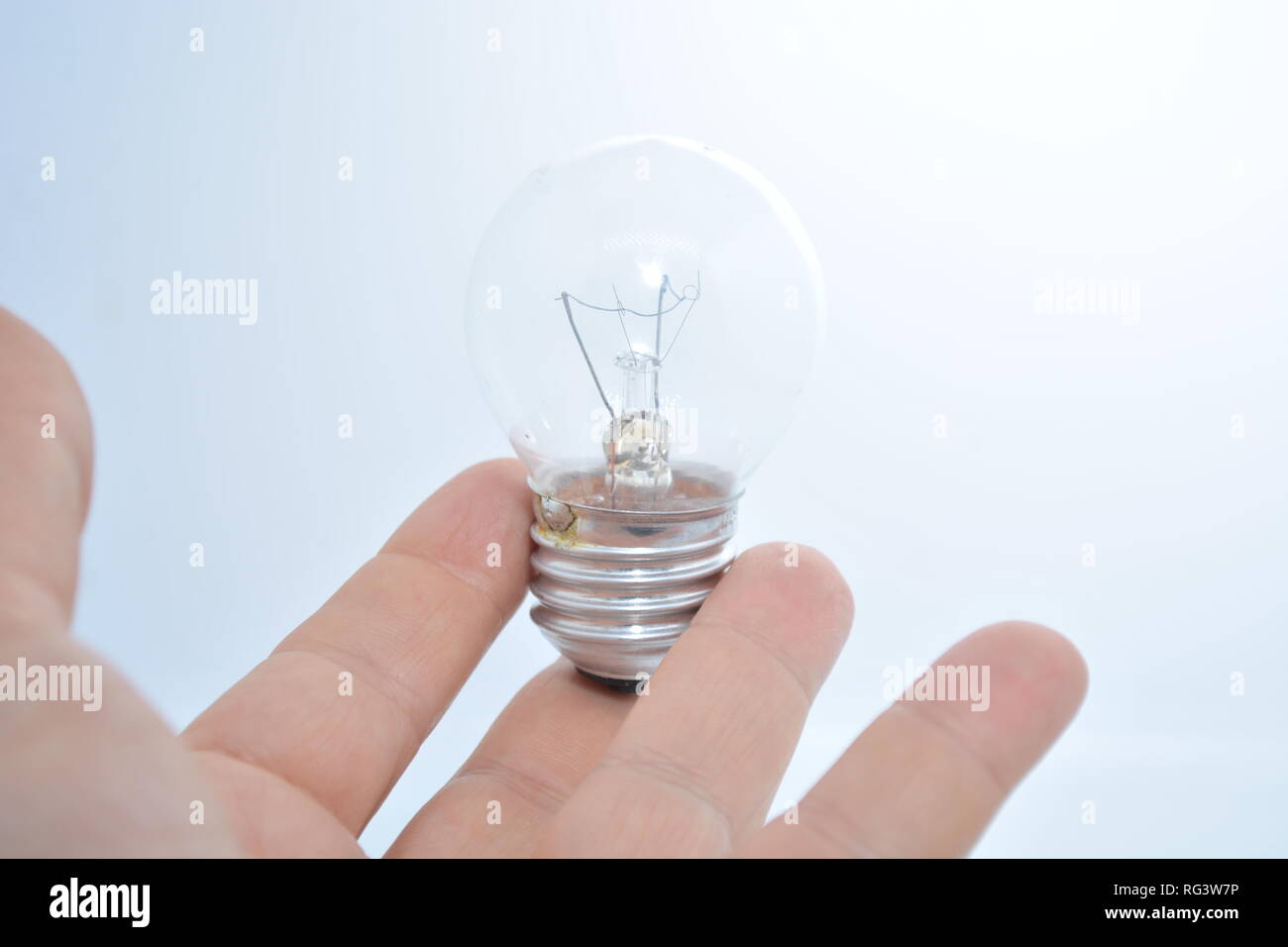 electric lamp on the hand energy power technology electricity Stock ...