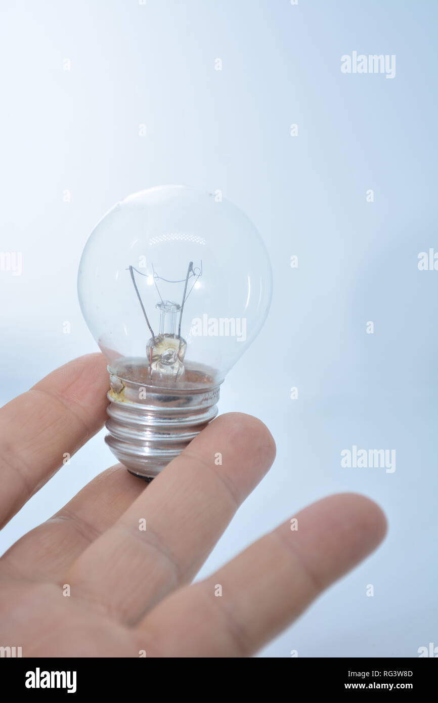 electric lamp on the hand energy power technology electricity Stock ...