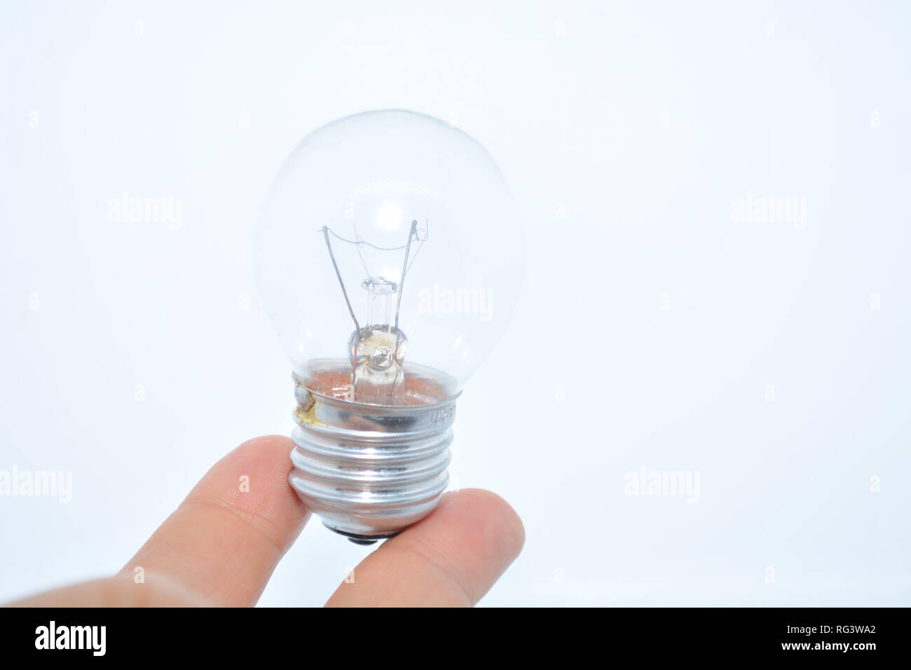 electric lamp on the hand energy power technology electricity Stock ...