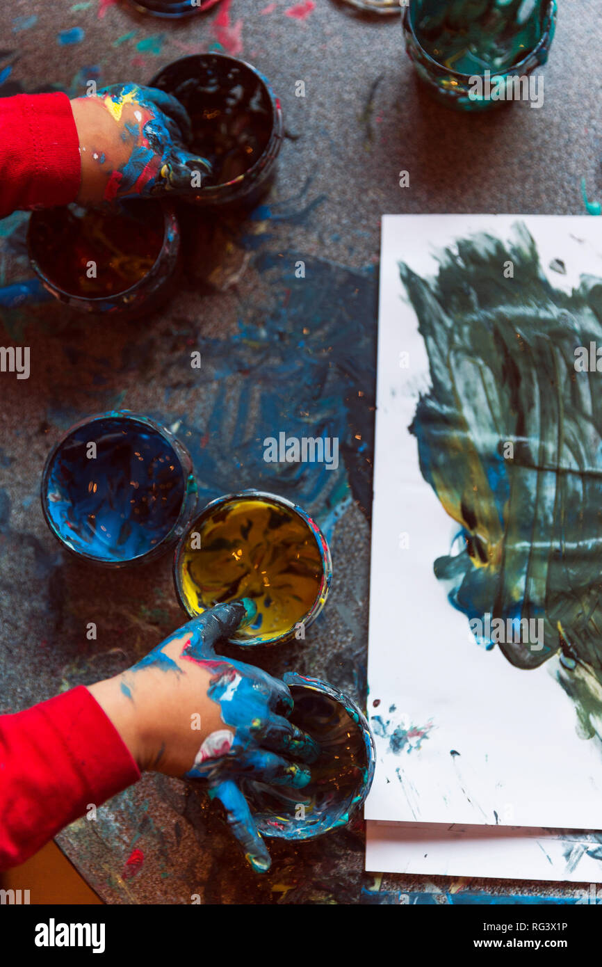 Boy finger painting hi-res stock photography and images - Alamy