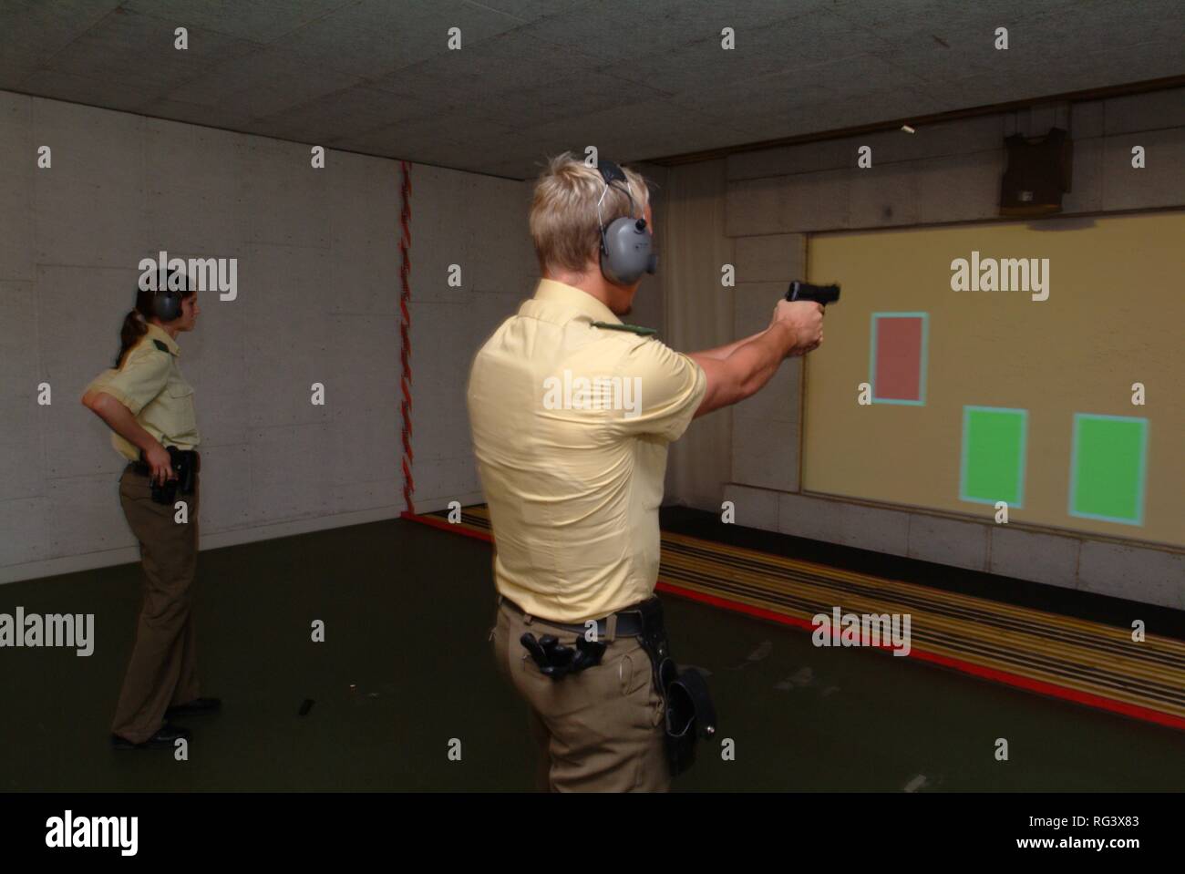 DEU, Germany, Essen : German police officer in a training shooting ...