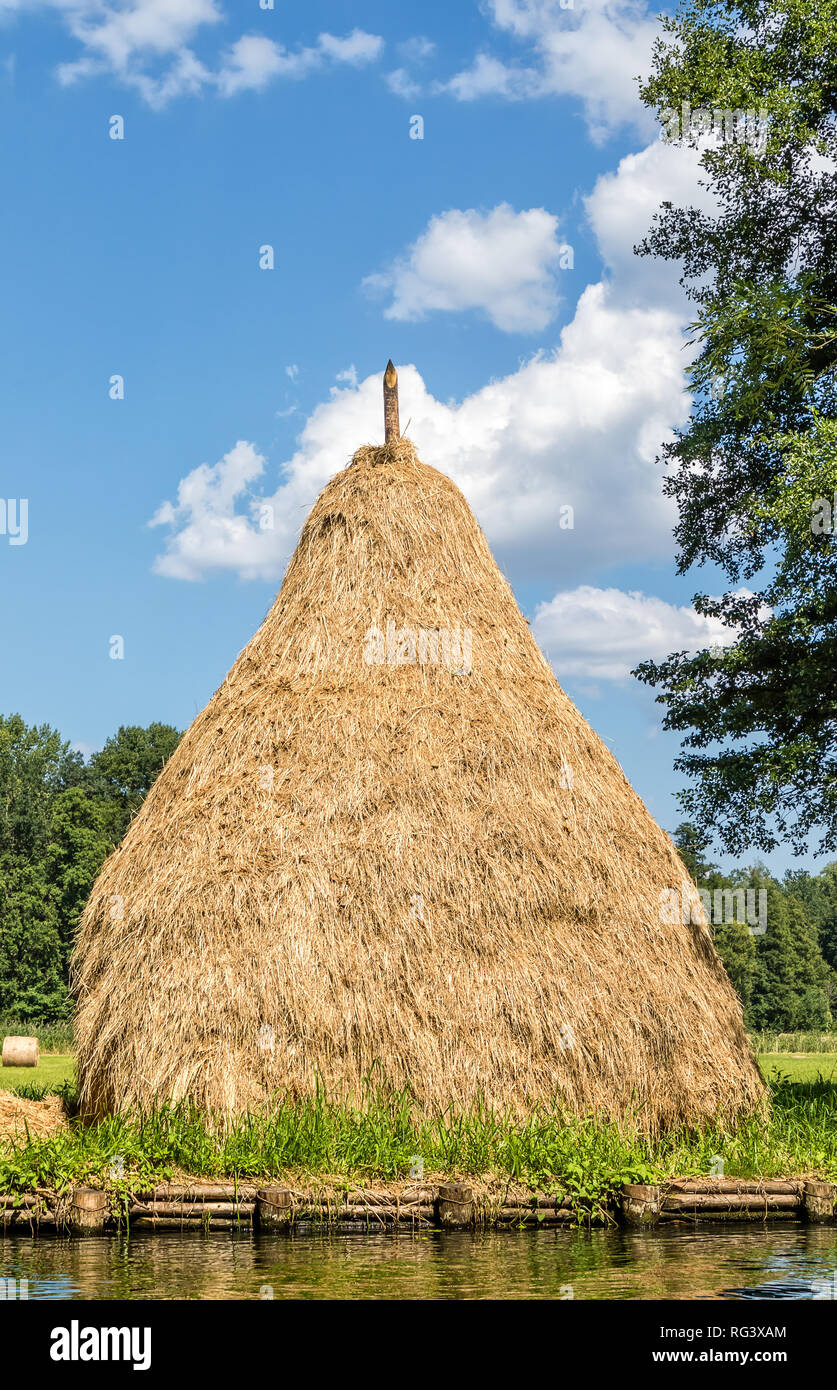 Landscape with giant haystack in the Spreewald Biosphere Reserve ...