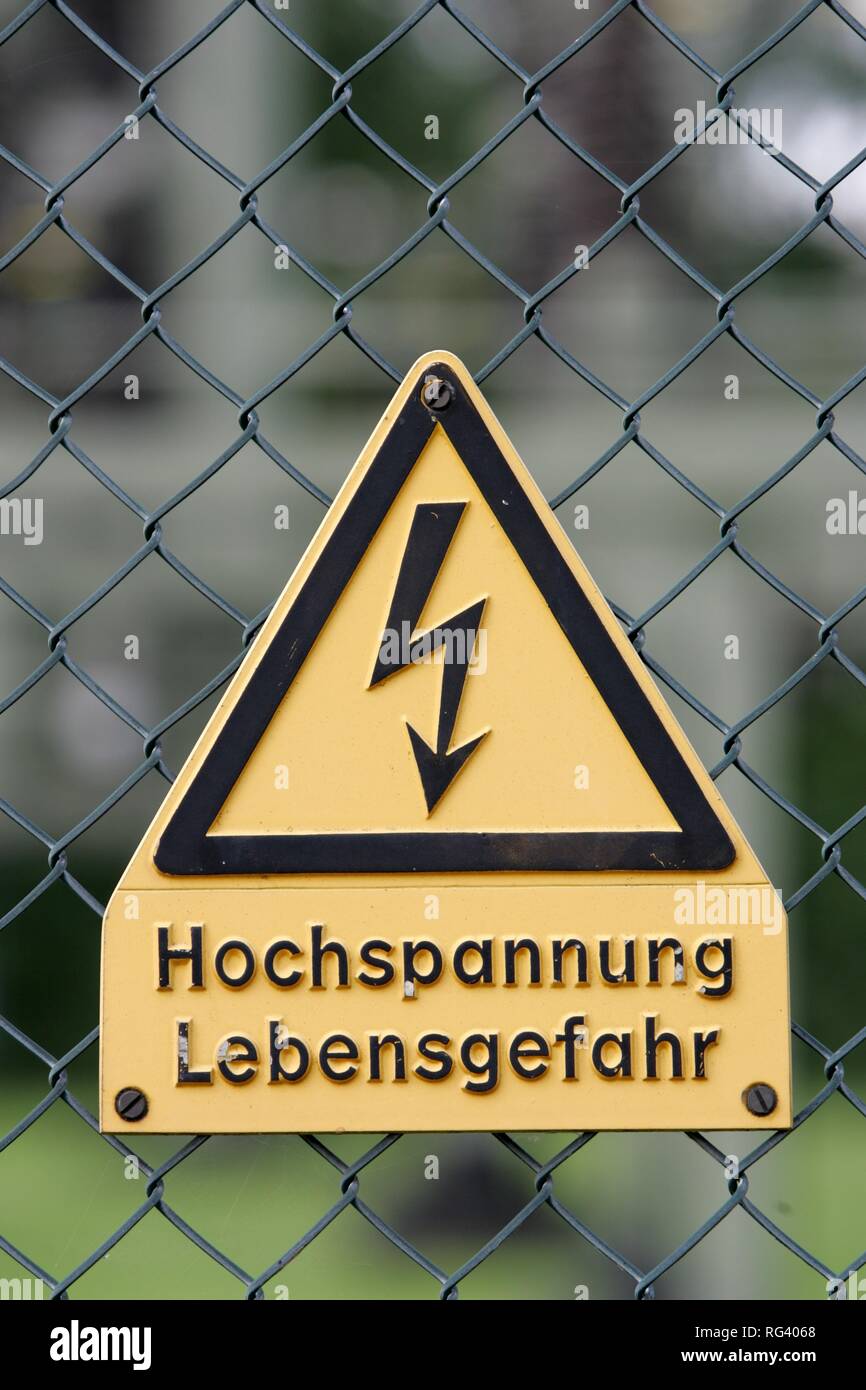 DEU, Germany: High voltage, keep off. Warning sign at an electrical ...