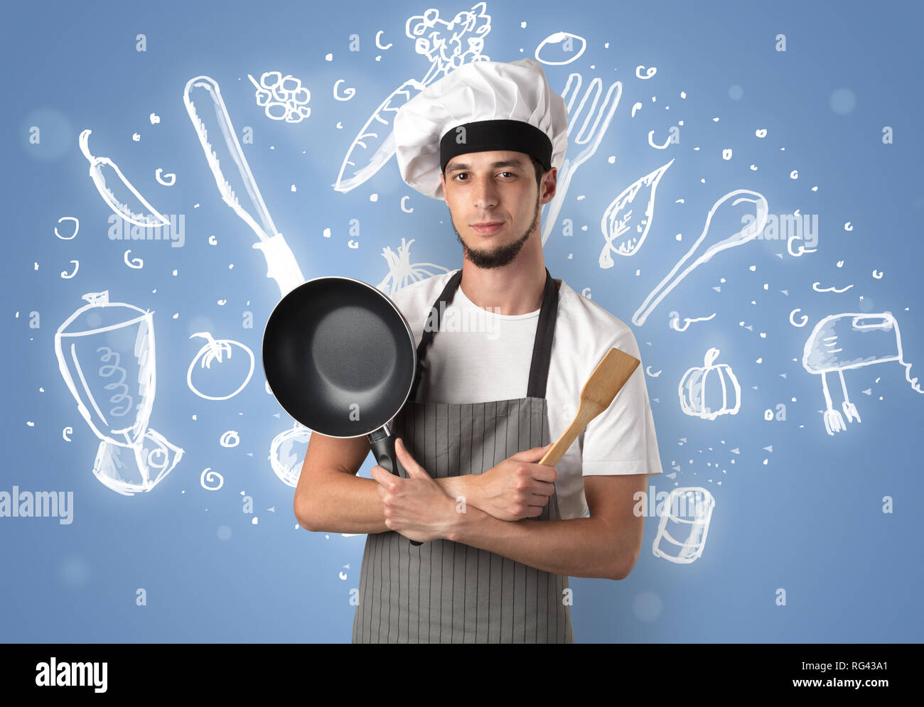 Young cook with kitchen instruments and drawn recipe concept on ...