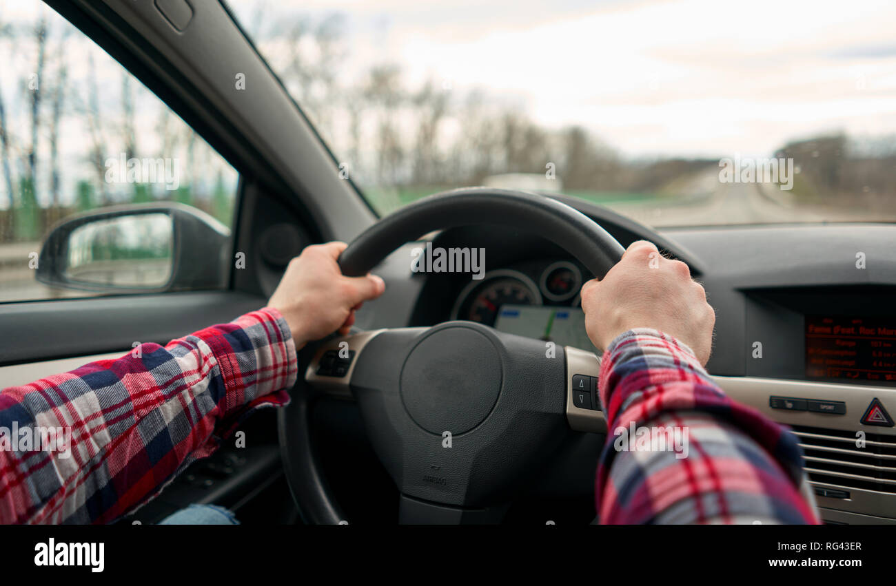 man behind the wheel Stock Photo - Alamy