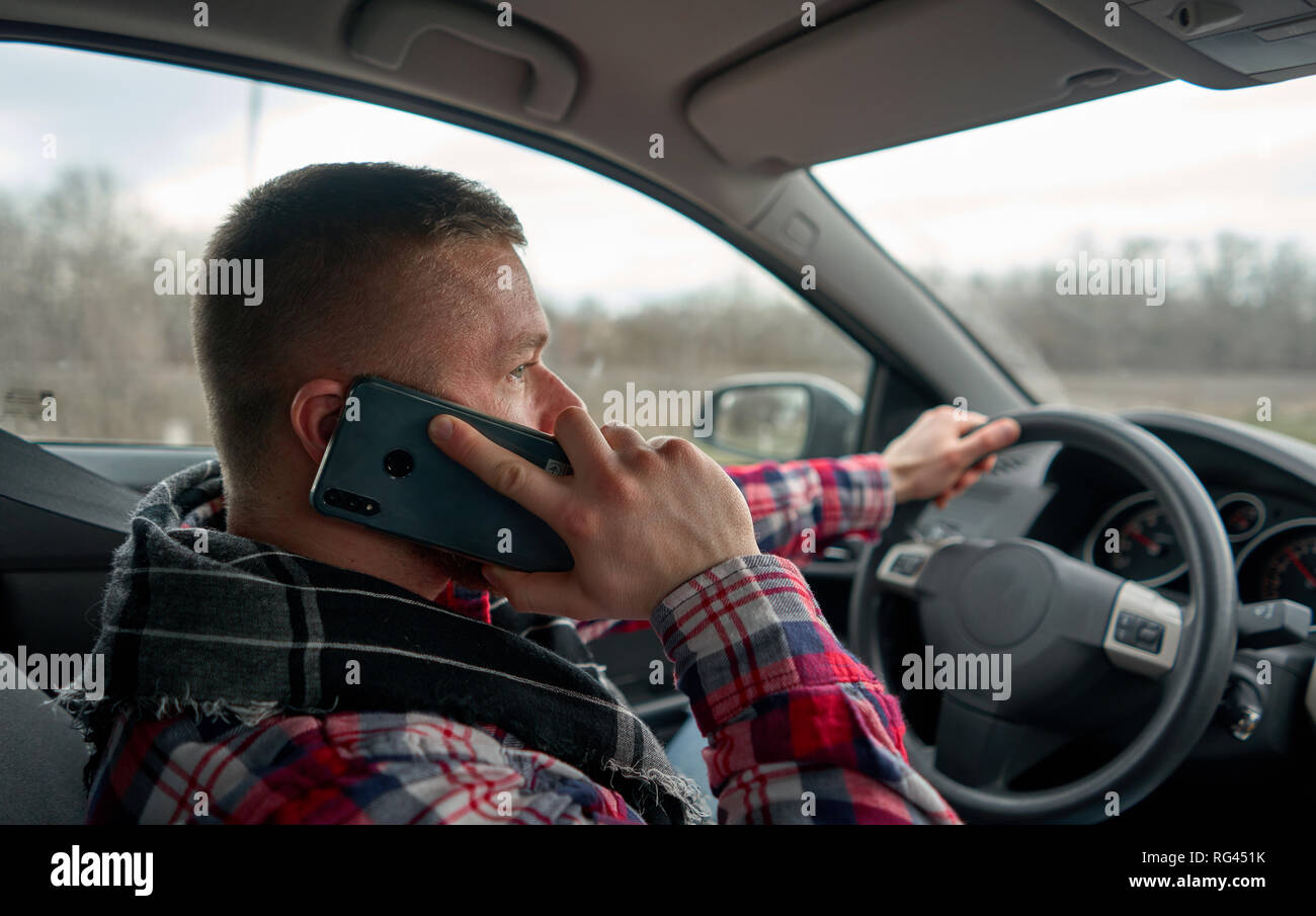 man behind the wheel Stock Photo - Alamy