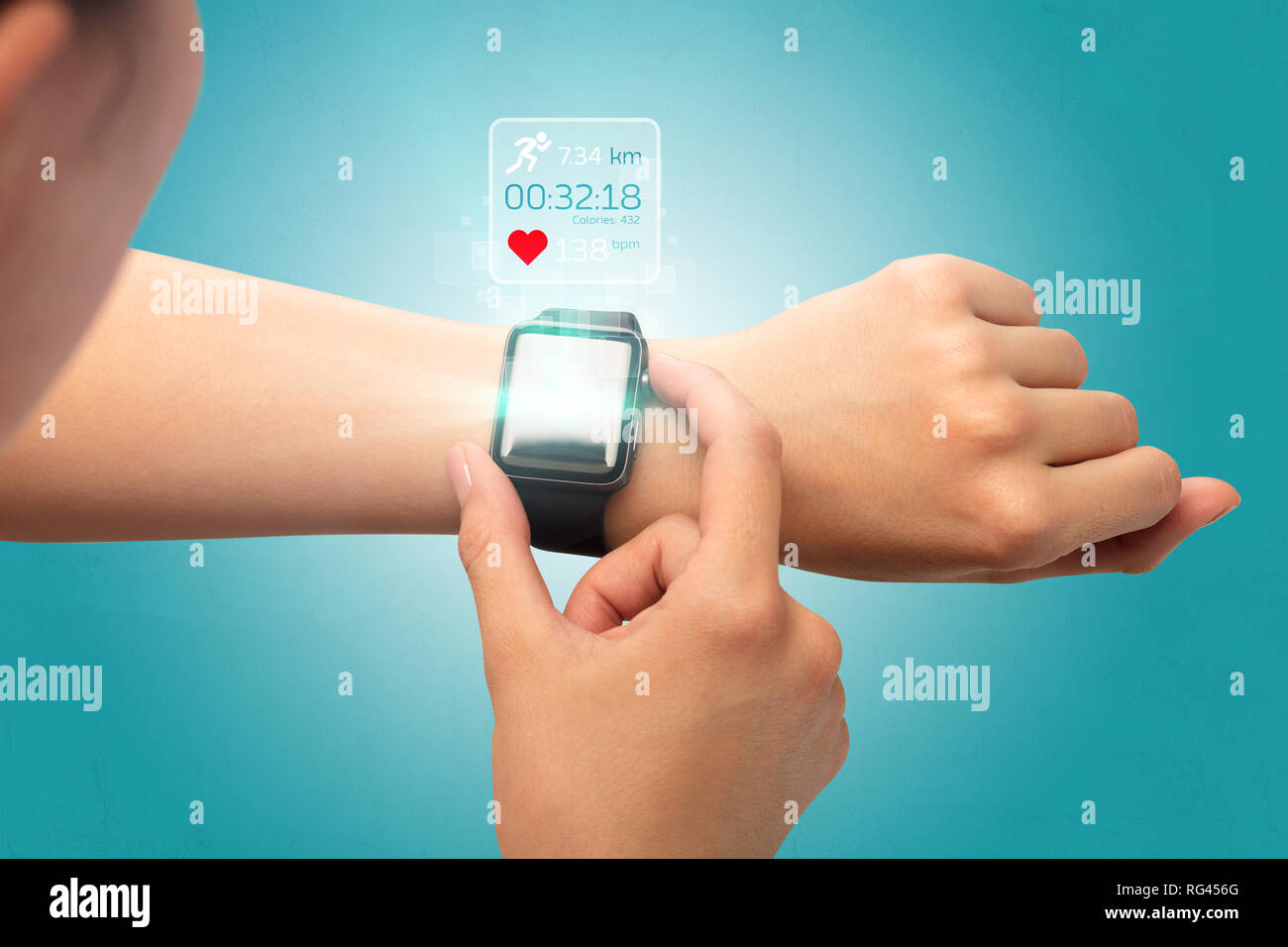 Female hand with smartwatch and running concept above Stock Photo - Alamy