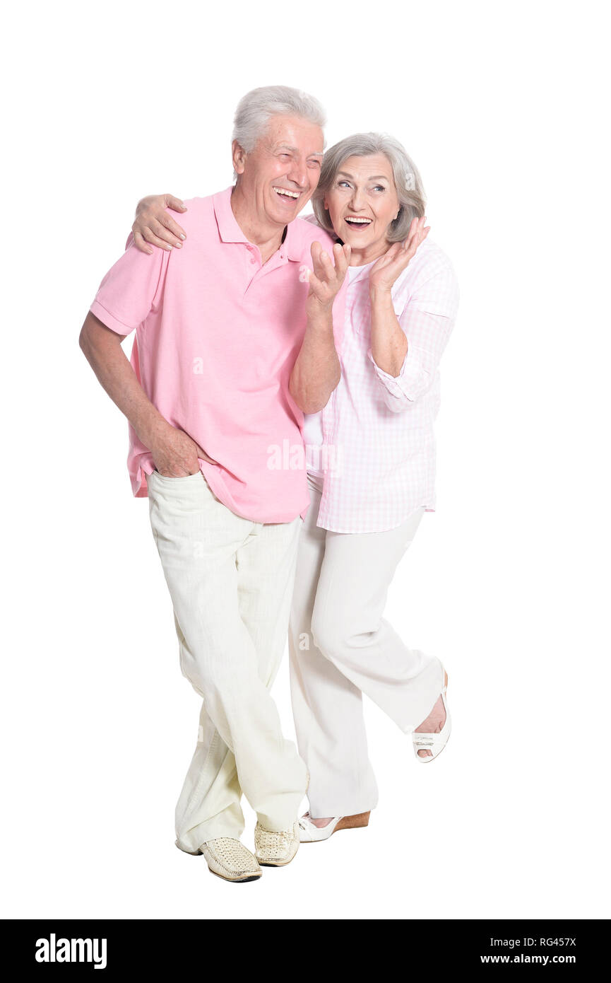 portrait of senior couple hugging on white background Stock Photo - Alamy