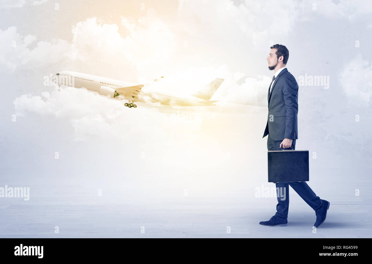 Businessman on airplane runway hi-res stock photography and images - Alamy