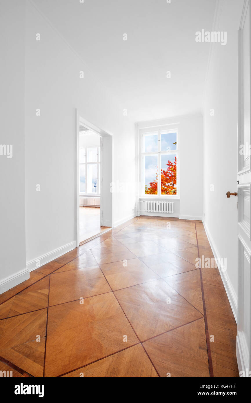 empty room with historic parquet floor newly renovated old building ...