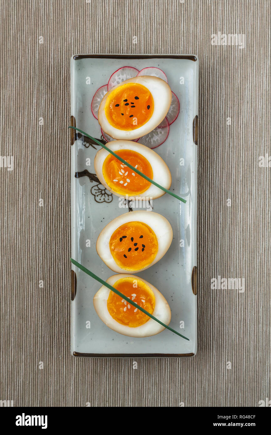 Marinated egg for ramen or nitamago, top view Stock Photo - Alamy