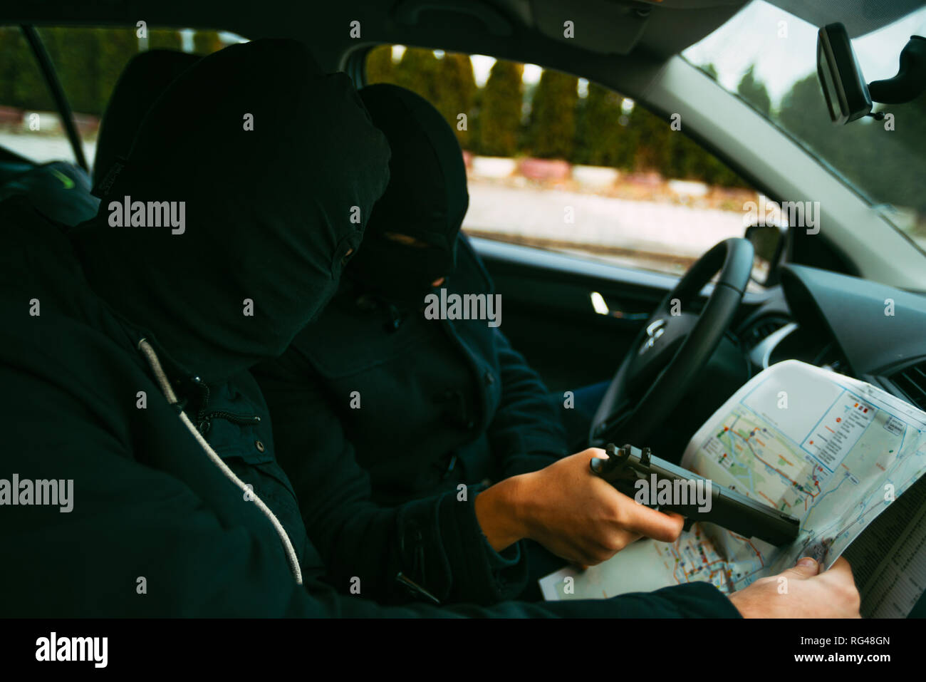 Masked armed robbers hi-res stock photography and images - Alamy