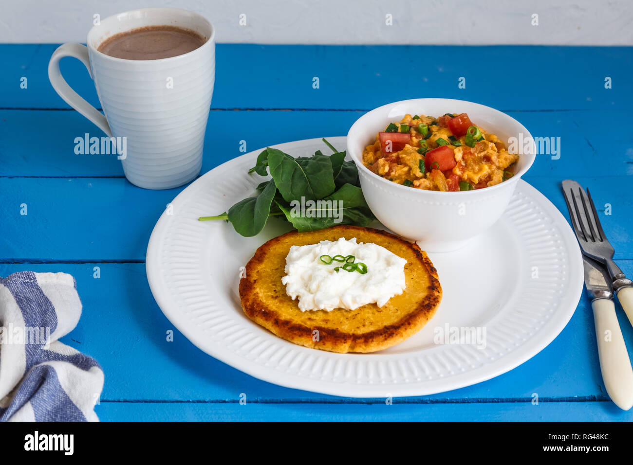 Traditional colombian breakfast huevos pericos with corn cakes Stock ...