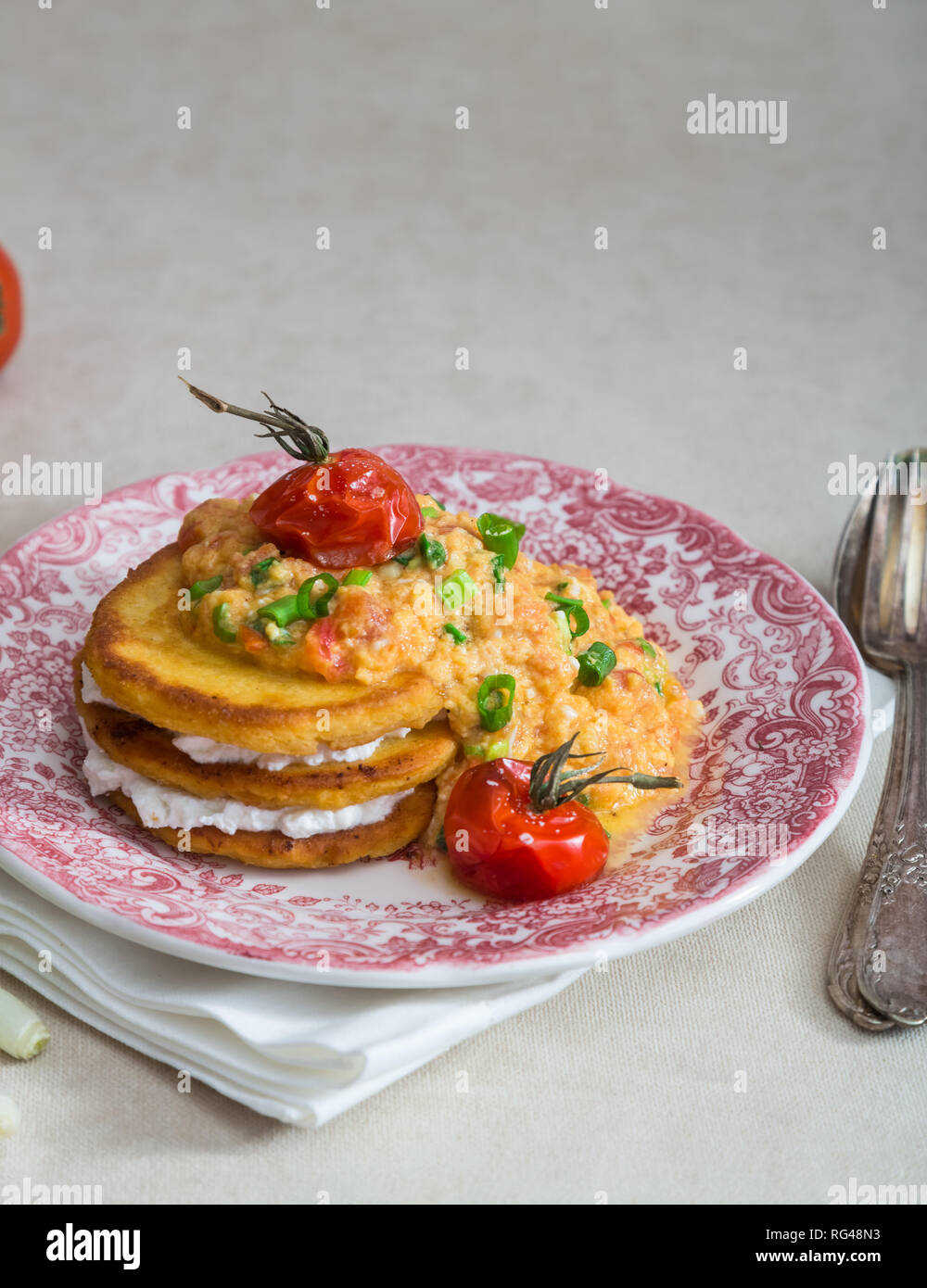 Traditional colombian breakfast huevos pericos with corn cakes Stock ...
