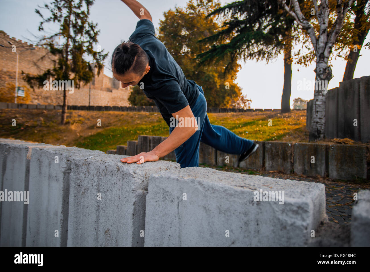 Man Climbing Over Wall Stock Photos & Man Climbing Over Wall Stock ...