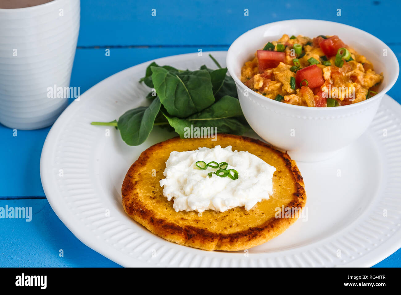 Traditional colombian breakfast huevos pericos with corn cakes Stock ...
