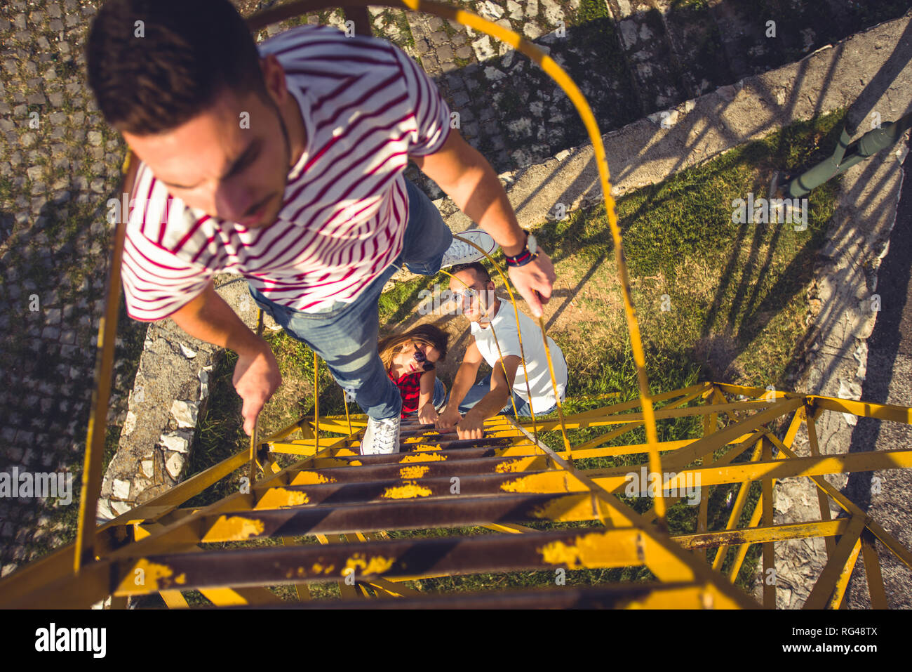 Friends Climbing Stairs High Resolution Stock Photography and Images ...